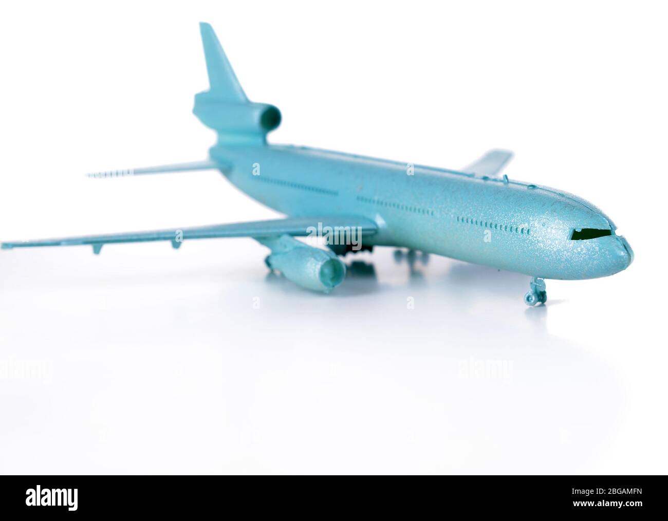 Plastic airplane isolated on white Stock Photo - Alamy