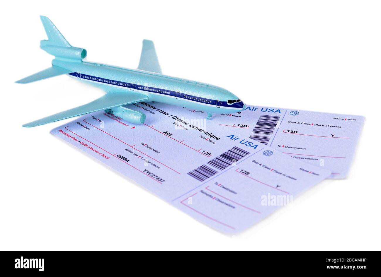 Airline tickets isolated on white Stock Photo - Alamy