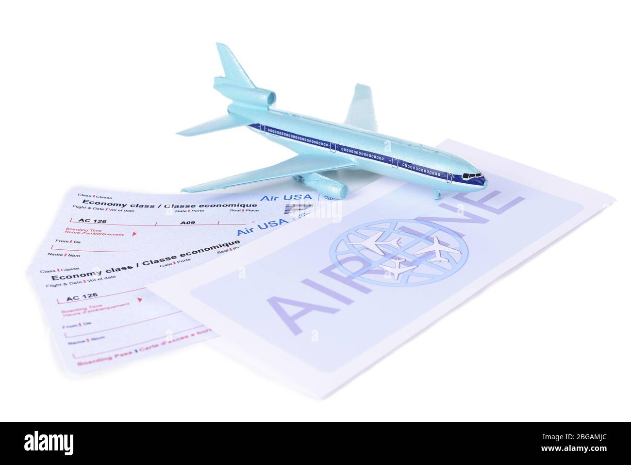 Airline tickets isolated on white Stock Photo - Alamy