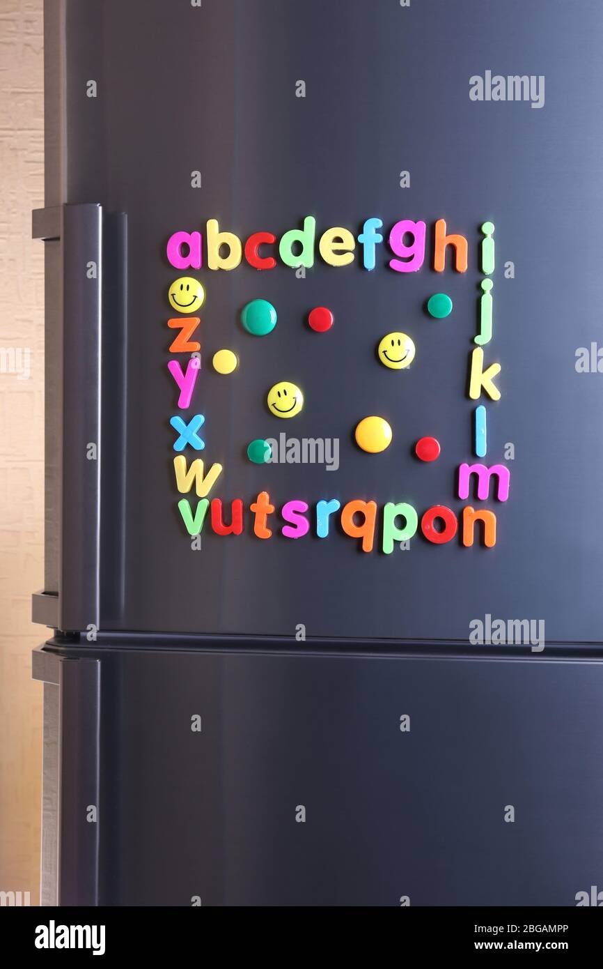 Colorful magnetic letters on refrigerator Stock Photo - Alamy