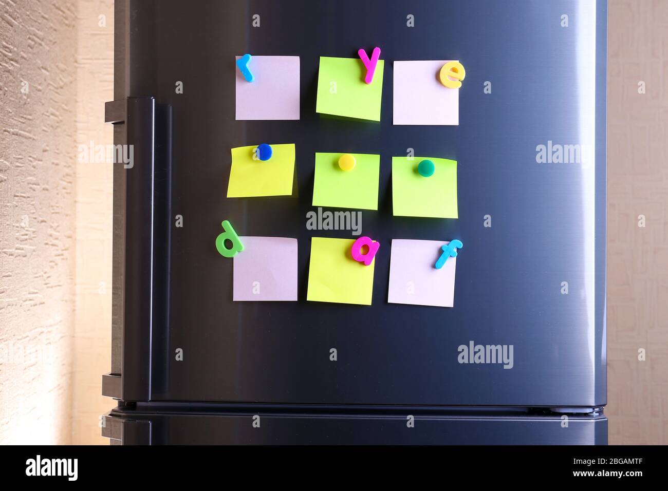 Empty paper sheets and colorful magnets on fridge door Stock Photo - Alamy