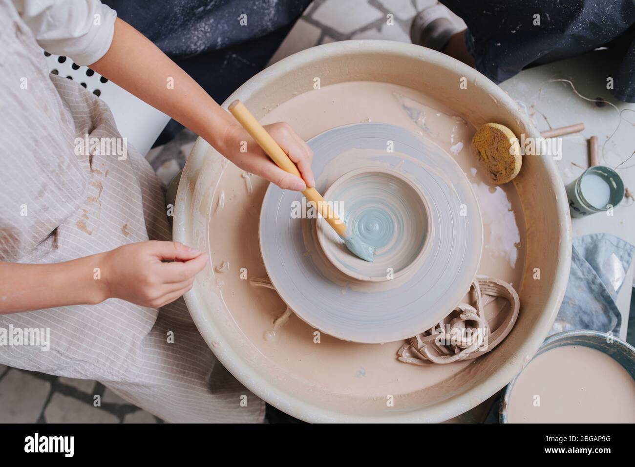 Girl painting pottery hi-res stock photography and images - Alamy