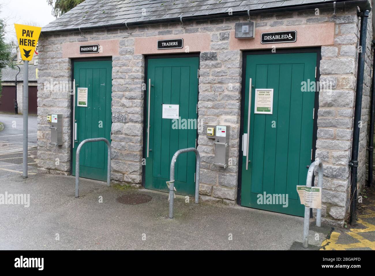 Bakewell Derbishire, row of public toilets with pay here sign Stock ...