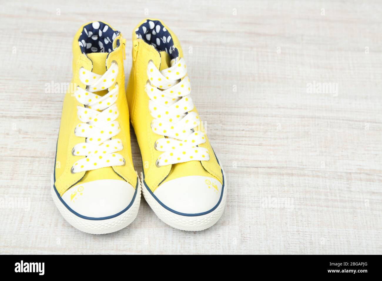 Beautiful gumshoes, on wooden floor Stock Photo - Alamy