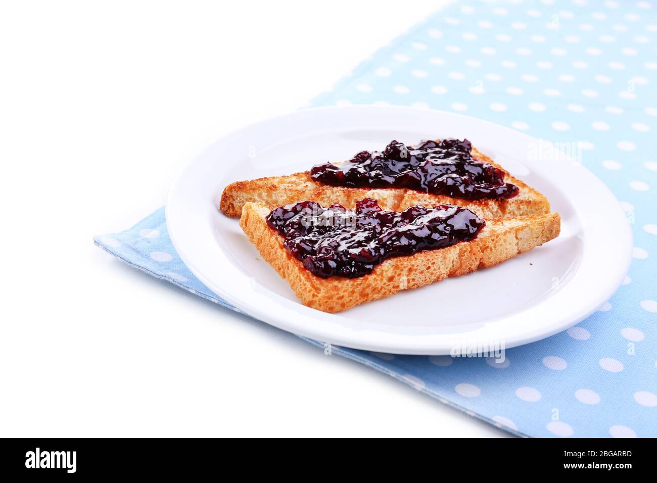 Delicious toast with jam on plate isolated on white Stock Photo - Alamy