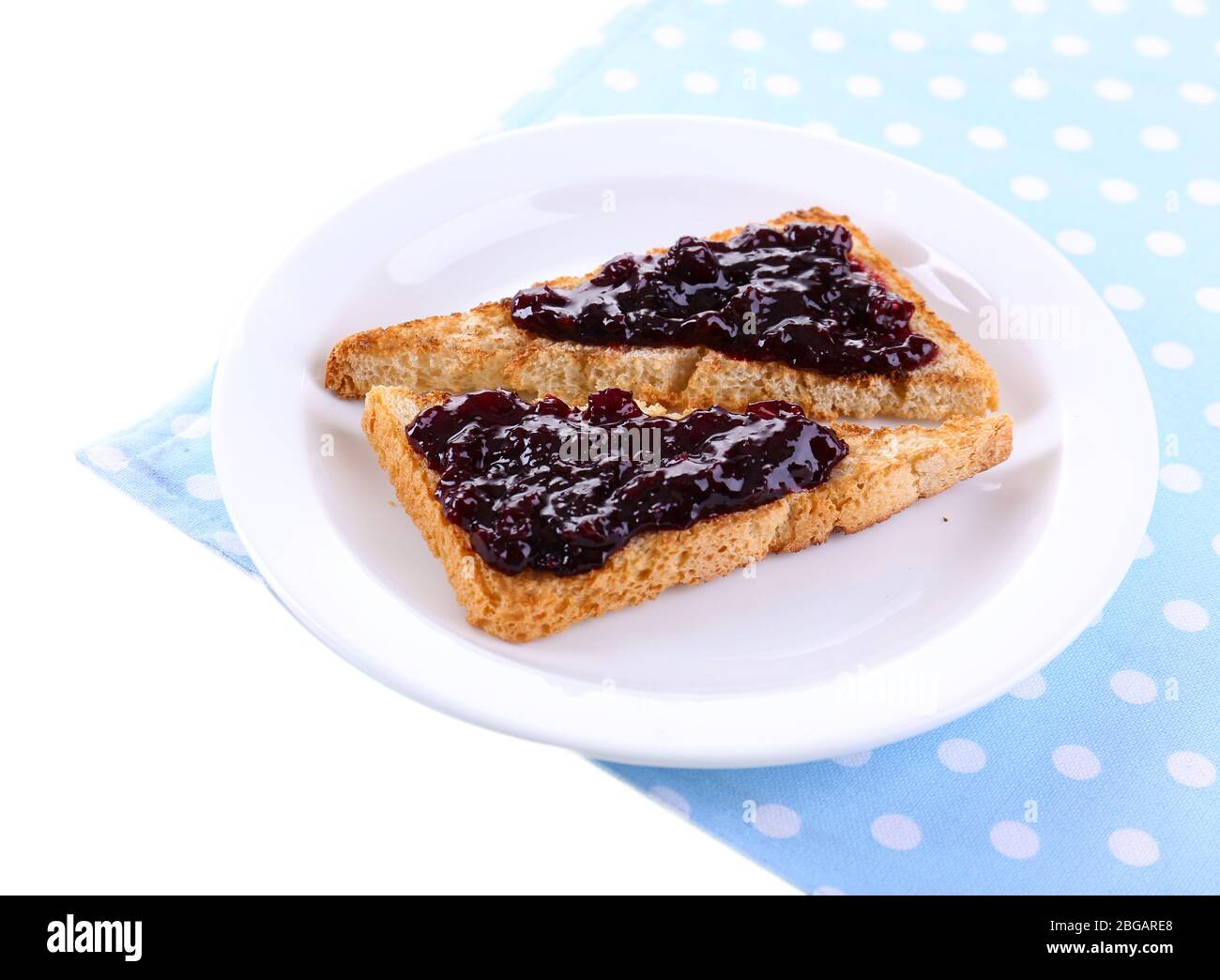 Delicious toast with jam on plate isolated on white Stock Photo - Alamy