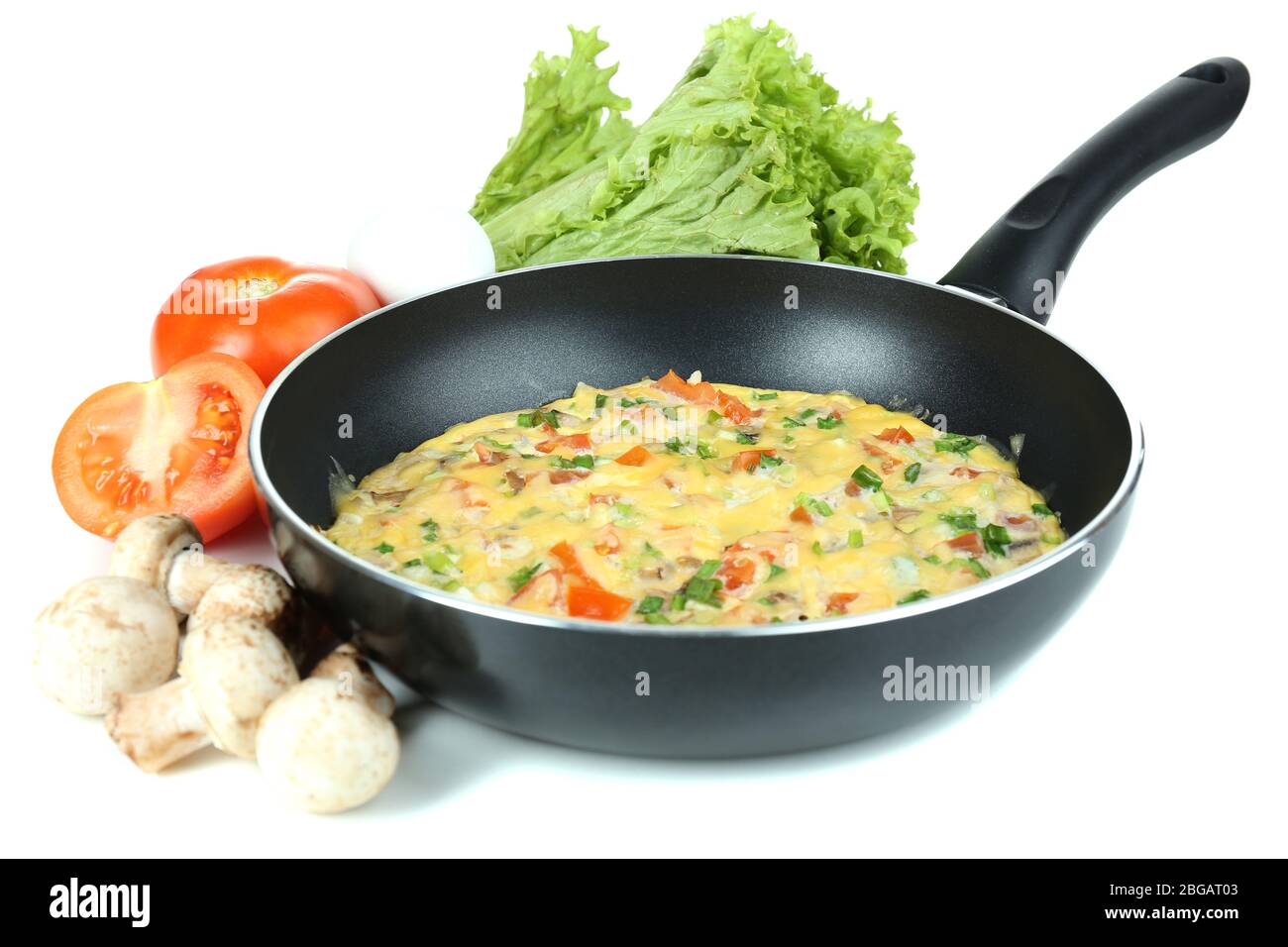 Omelet with vegetables isolated on white Stock Photo - Alamy
