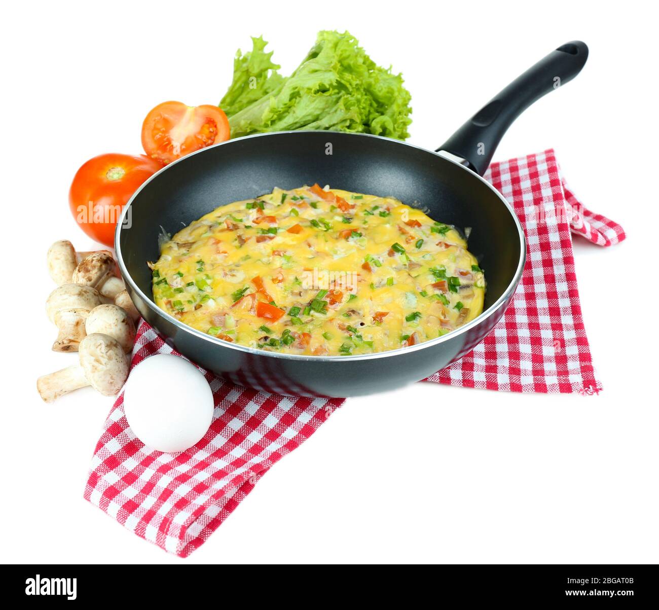 Omelet with vegetables isolated on white Stock Photo - Alamy
