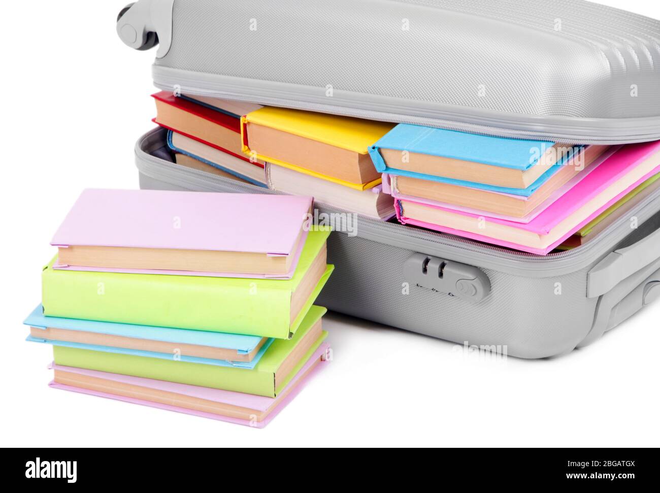 Suitcase with books isolated on white Stock Photo - Alamy