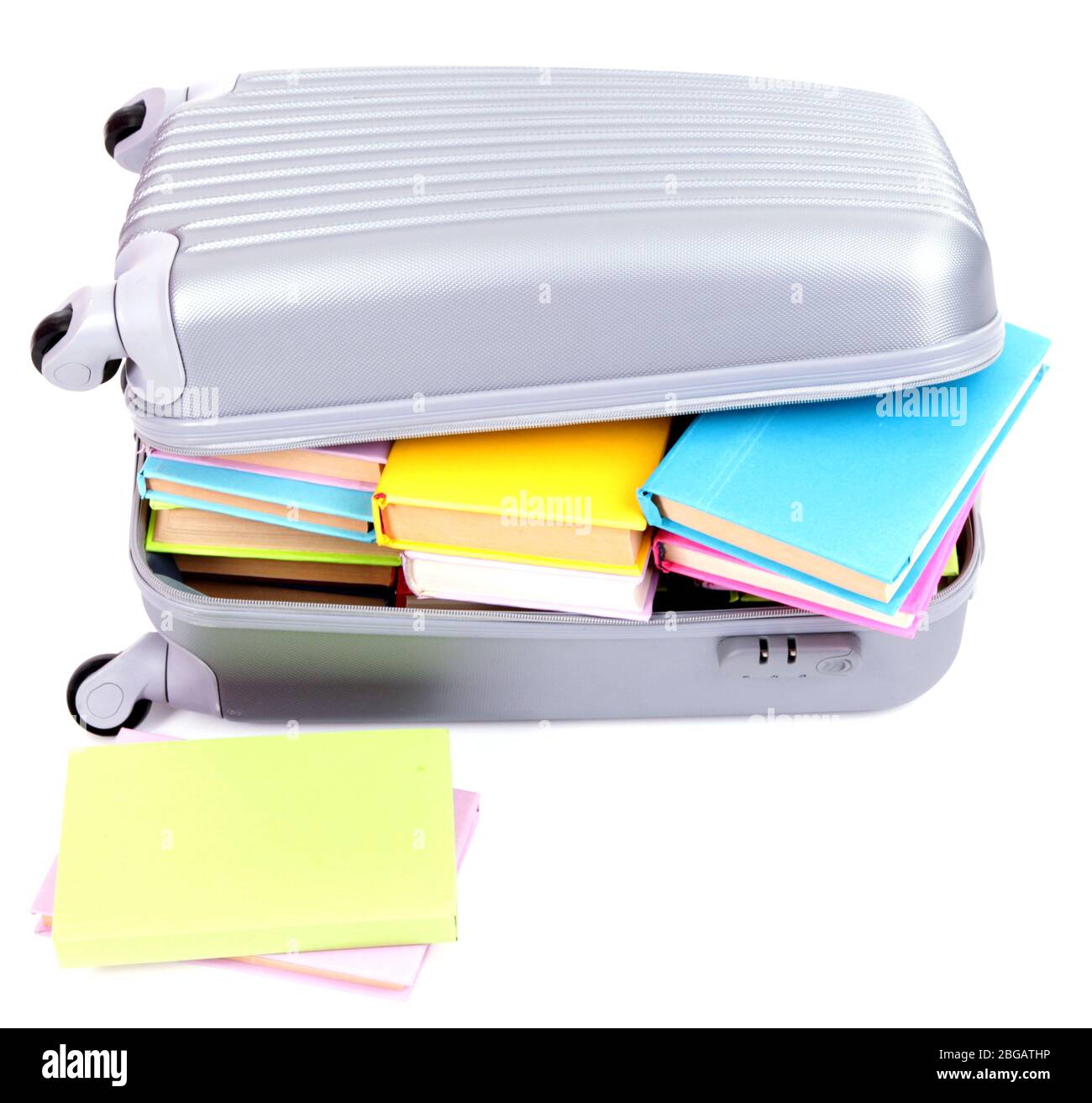 Suitcase with books isolated on white Stock Photo - Alamy