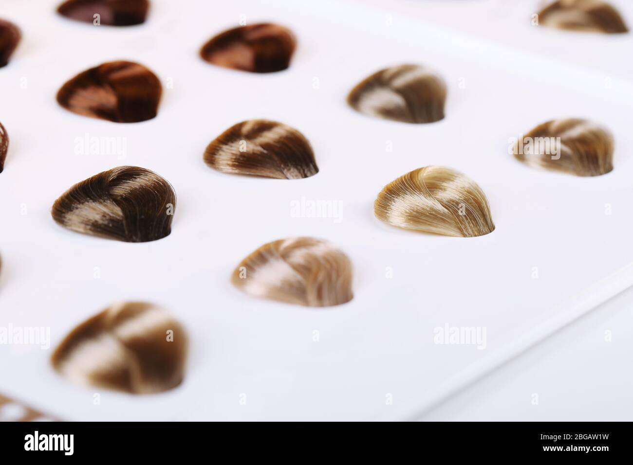 Hair samples of different colors on white background Stock Photo - Alamy