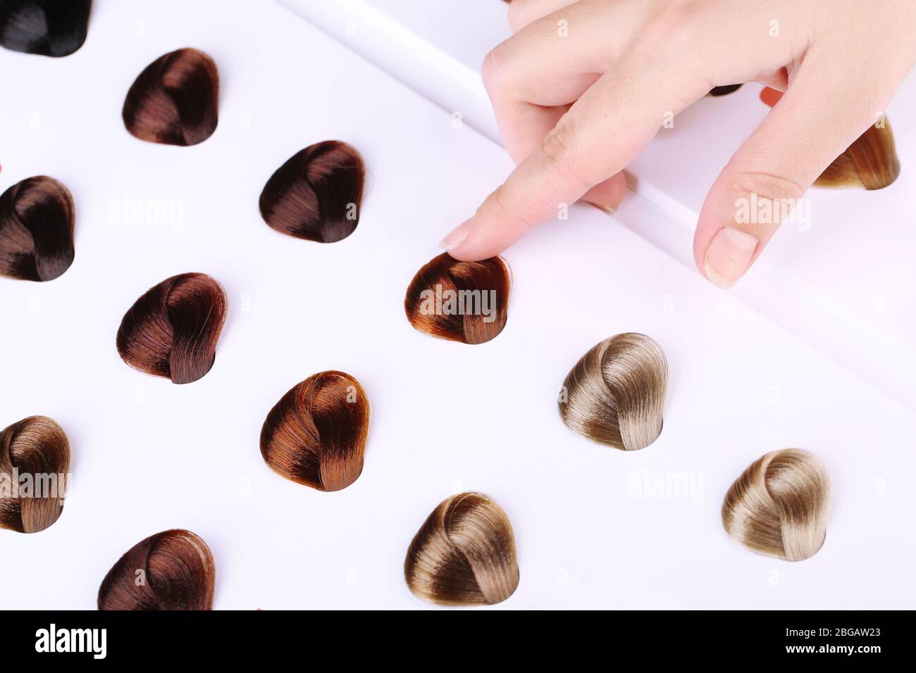 Hair samples of different colors on white background Stock Photo - Alamy
