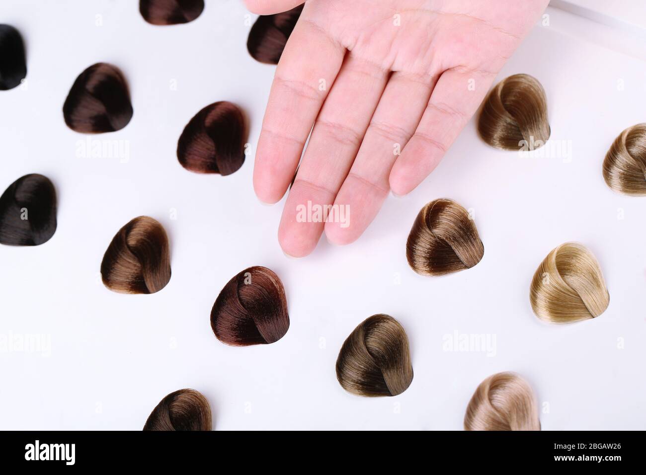 Hair samples of different colors on white background Stock Photo - Alamy