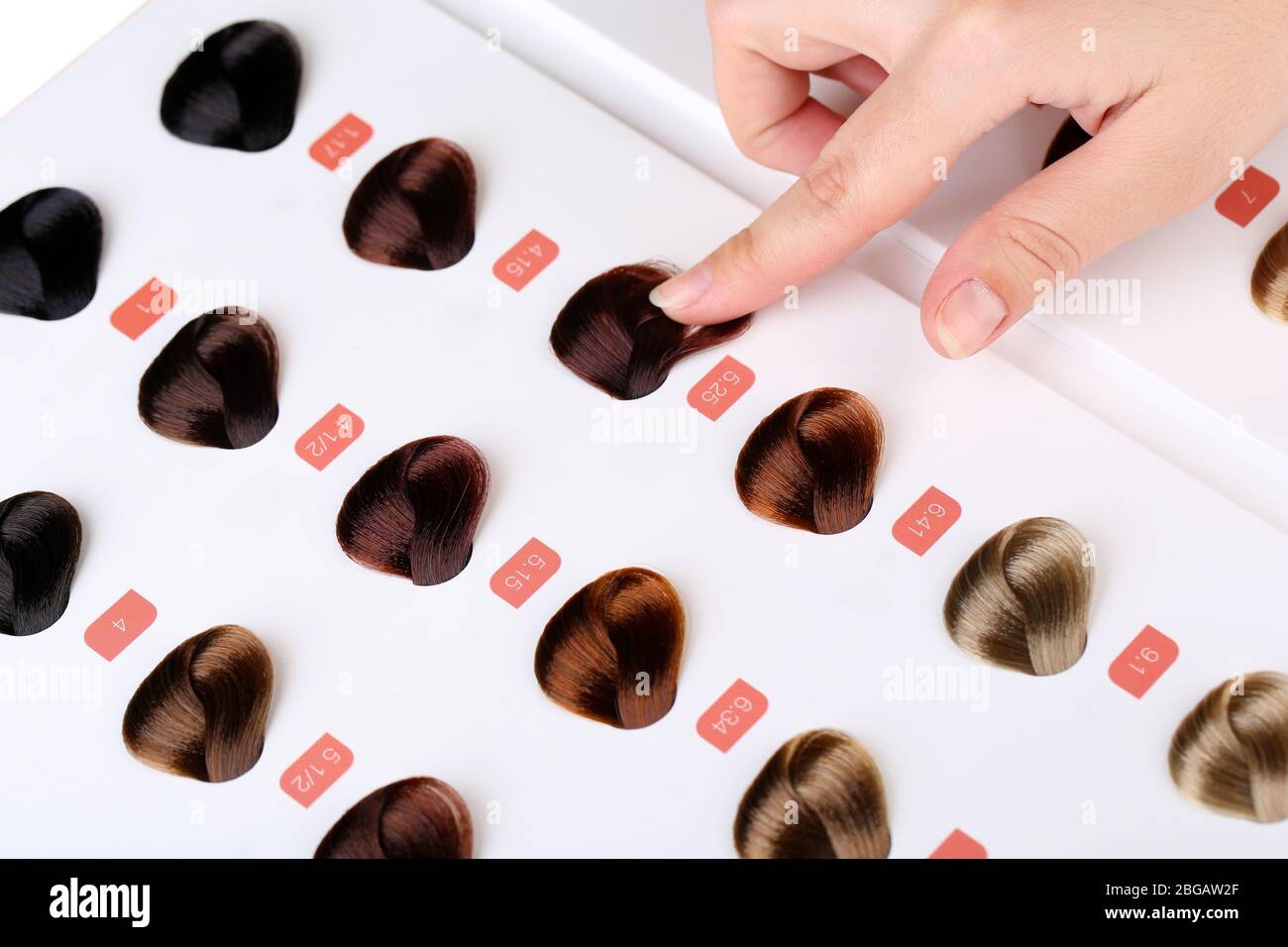 Hair samples of different colors on white background Stock Photo - Alamy