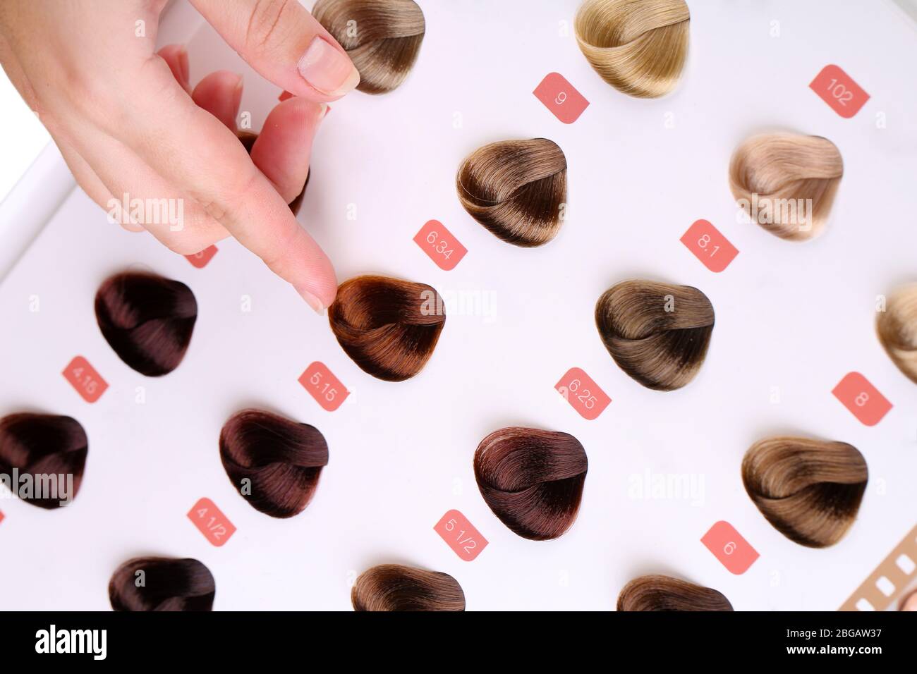 Hair samples of different colors on white background Stock Photo - Alamy