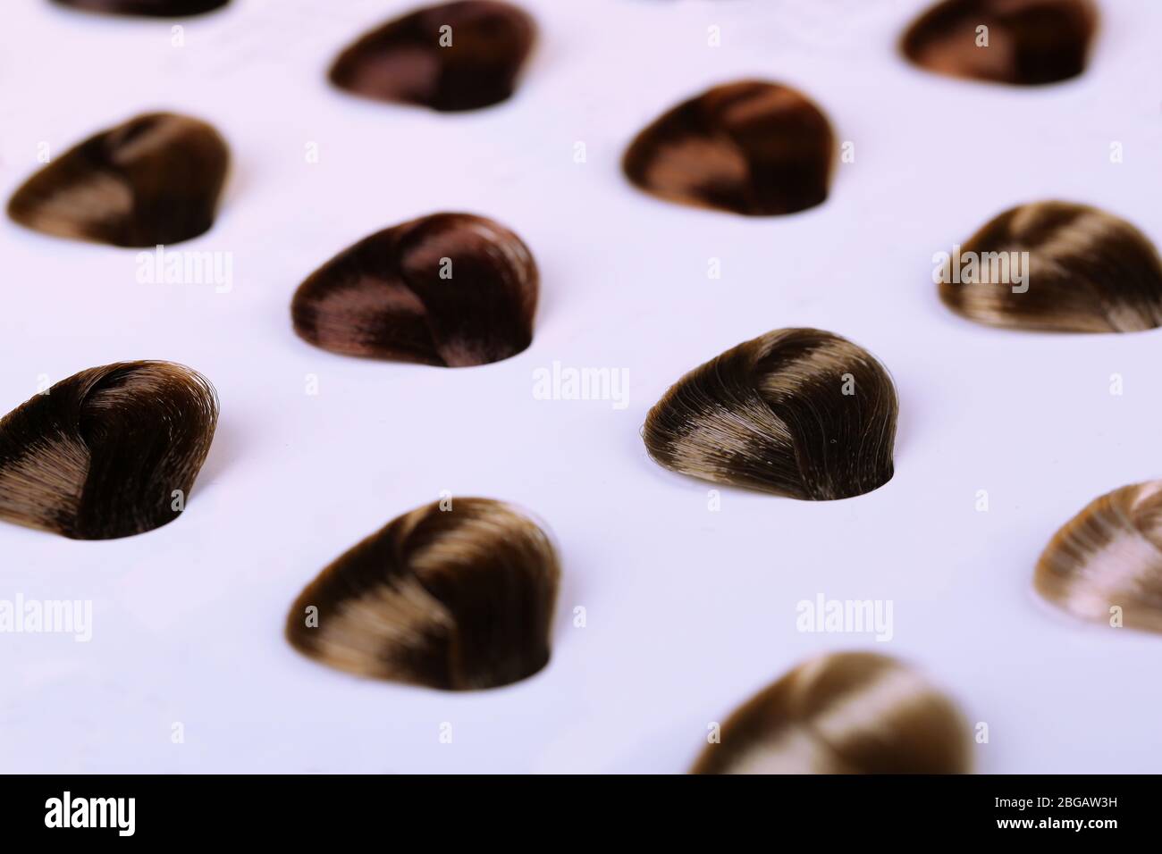 Hair samples of different colors on white background Stock Photo - Alamy