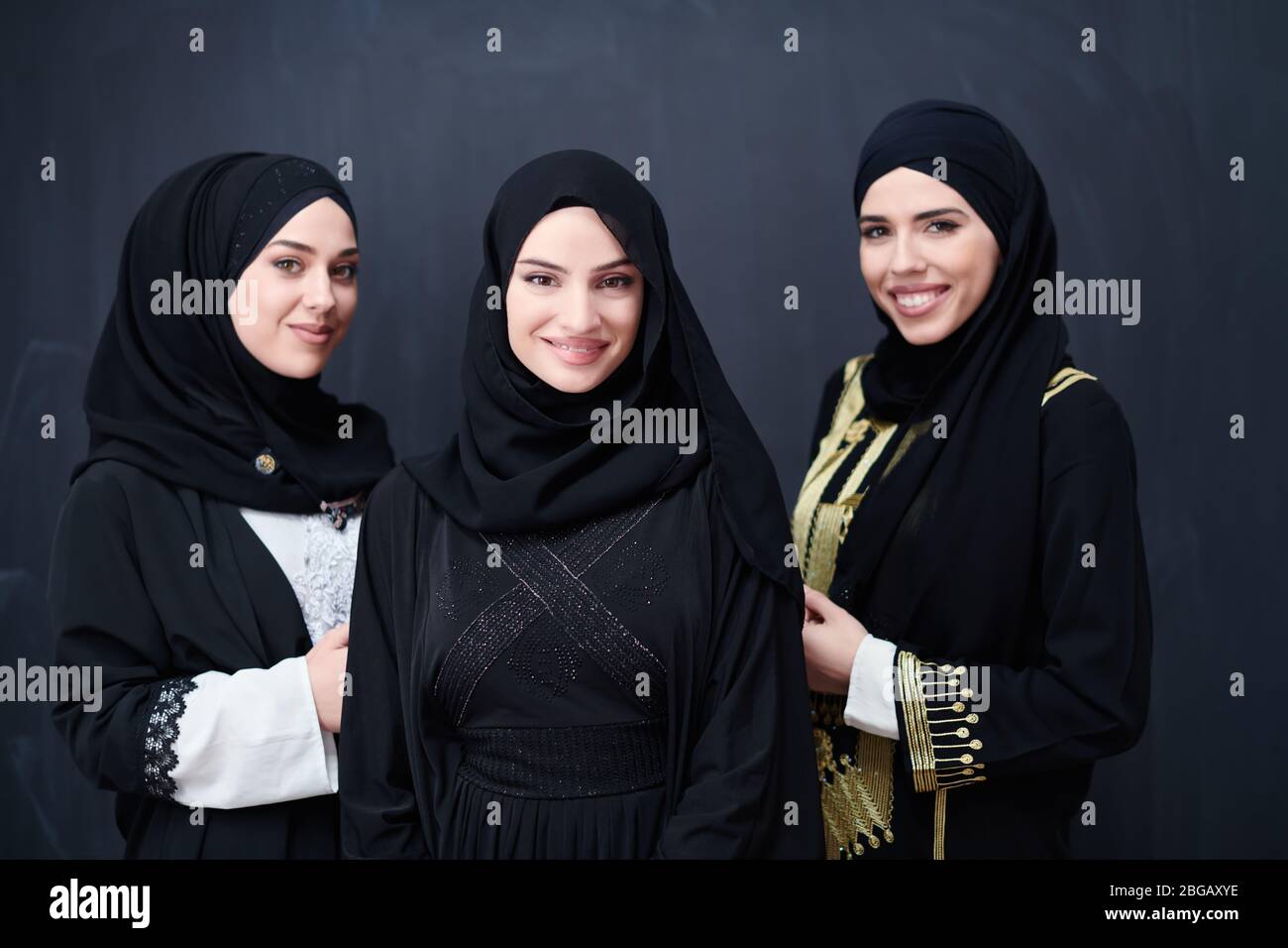 group portrait of beautiful muslim women in fashionable dress with ...