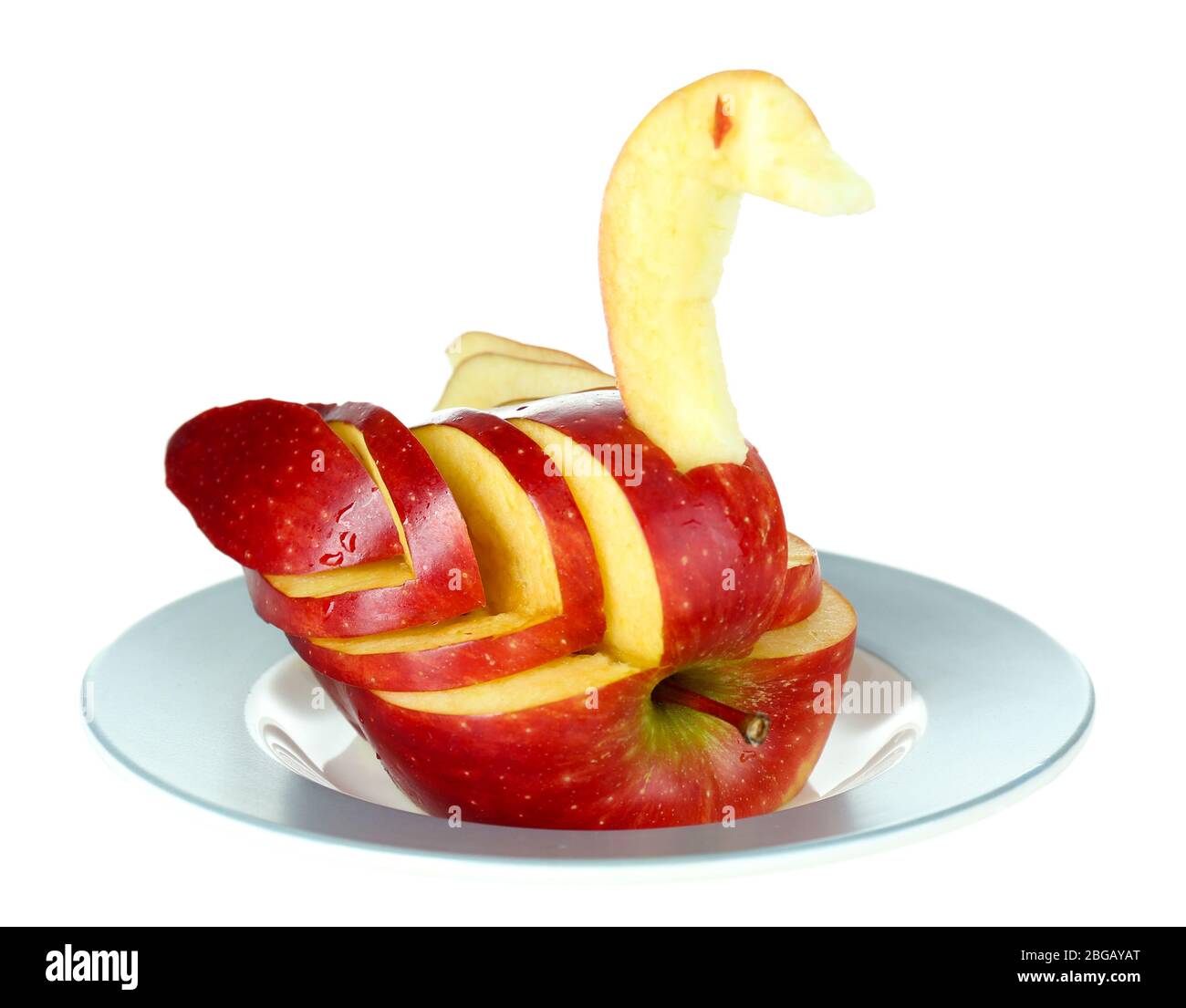 Carving fruit pattern of swan isolated on white Stock Photo - Alamy