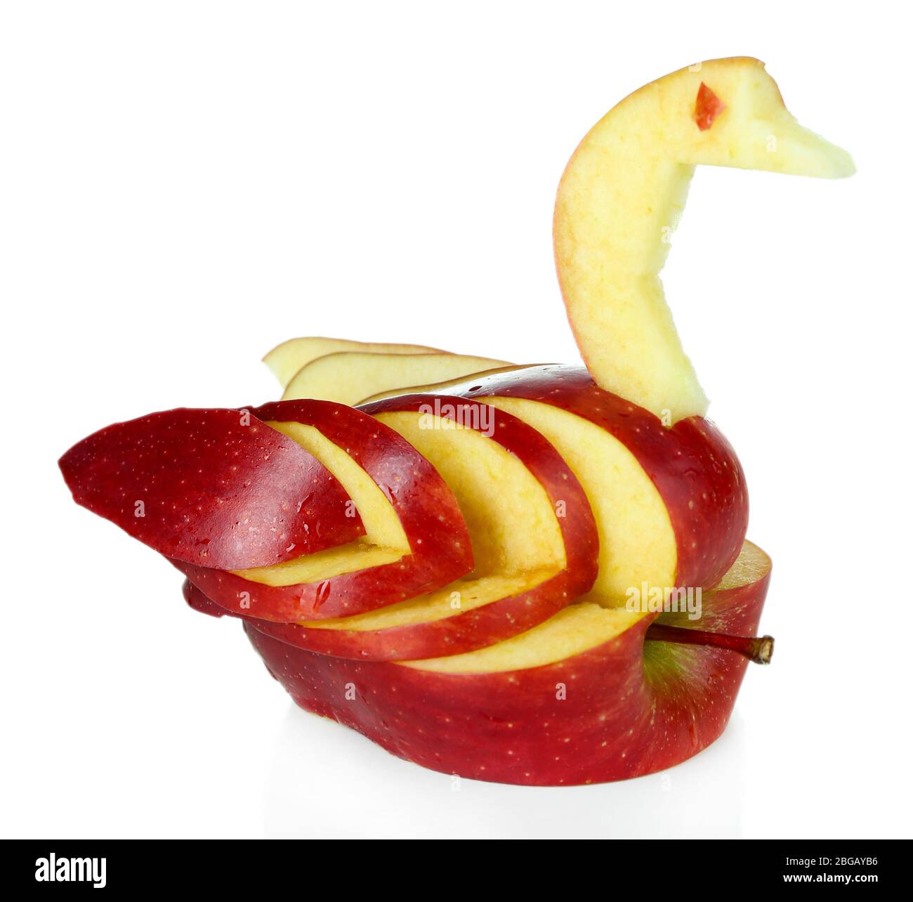 Carving fruit pattern of swan isolated on white Stock Photo - Alamy