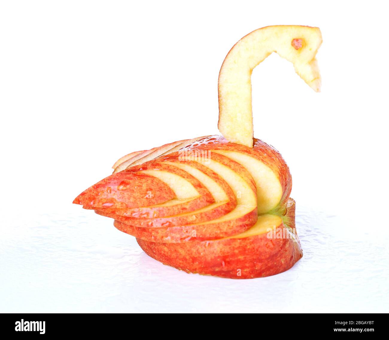Carving fruit pattern of swan isolated on white Stock Photo - Alamy