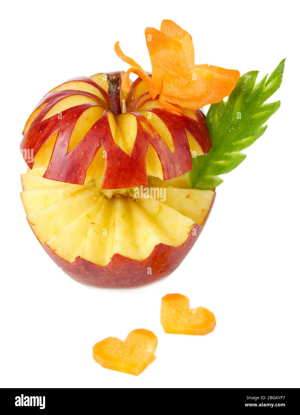Carving apple isolated on white Stock Photo - Alamy