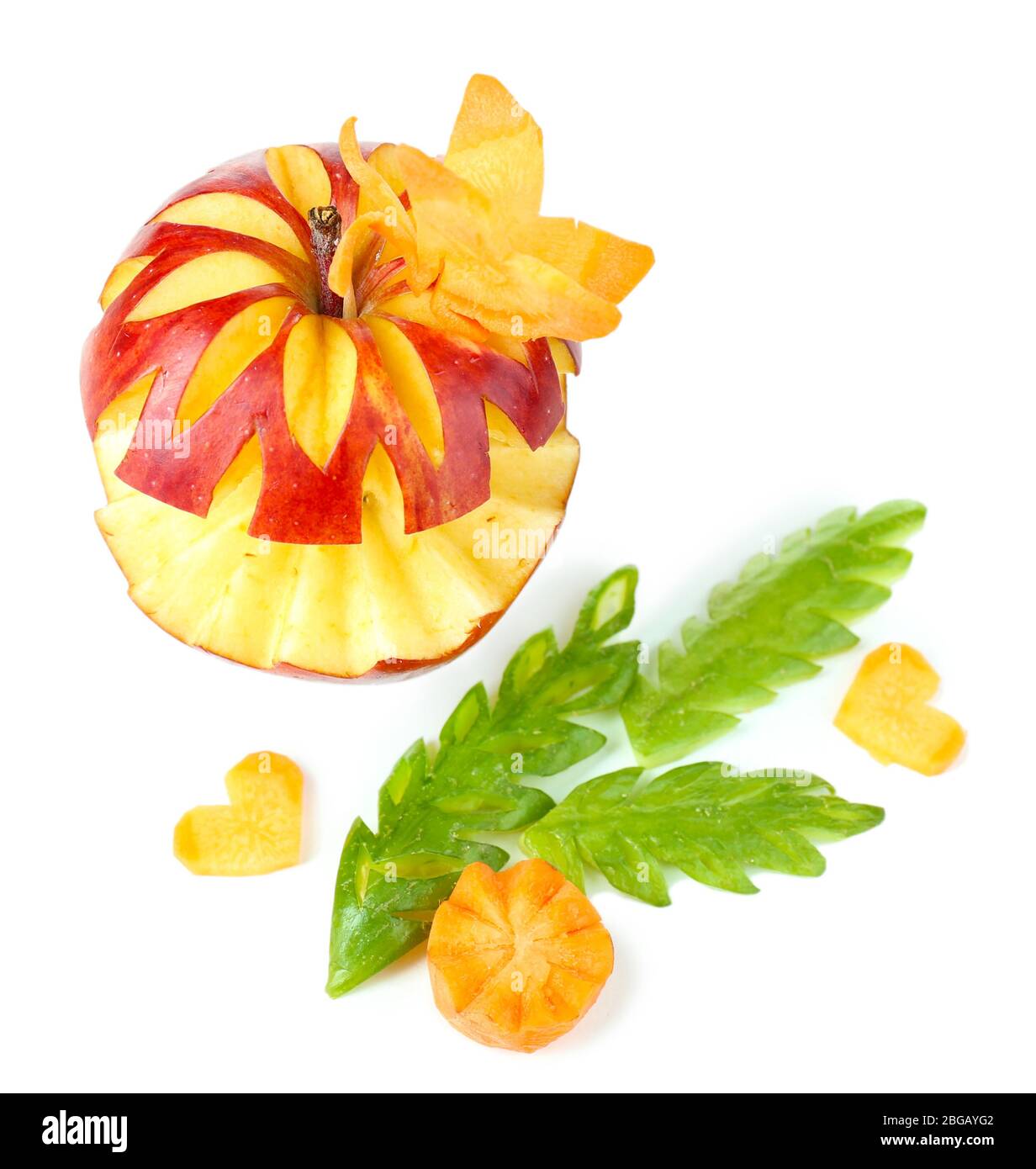 Carving apple isolated on white Stock Photo - Alamy