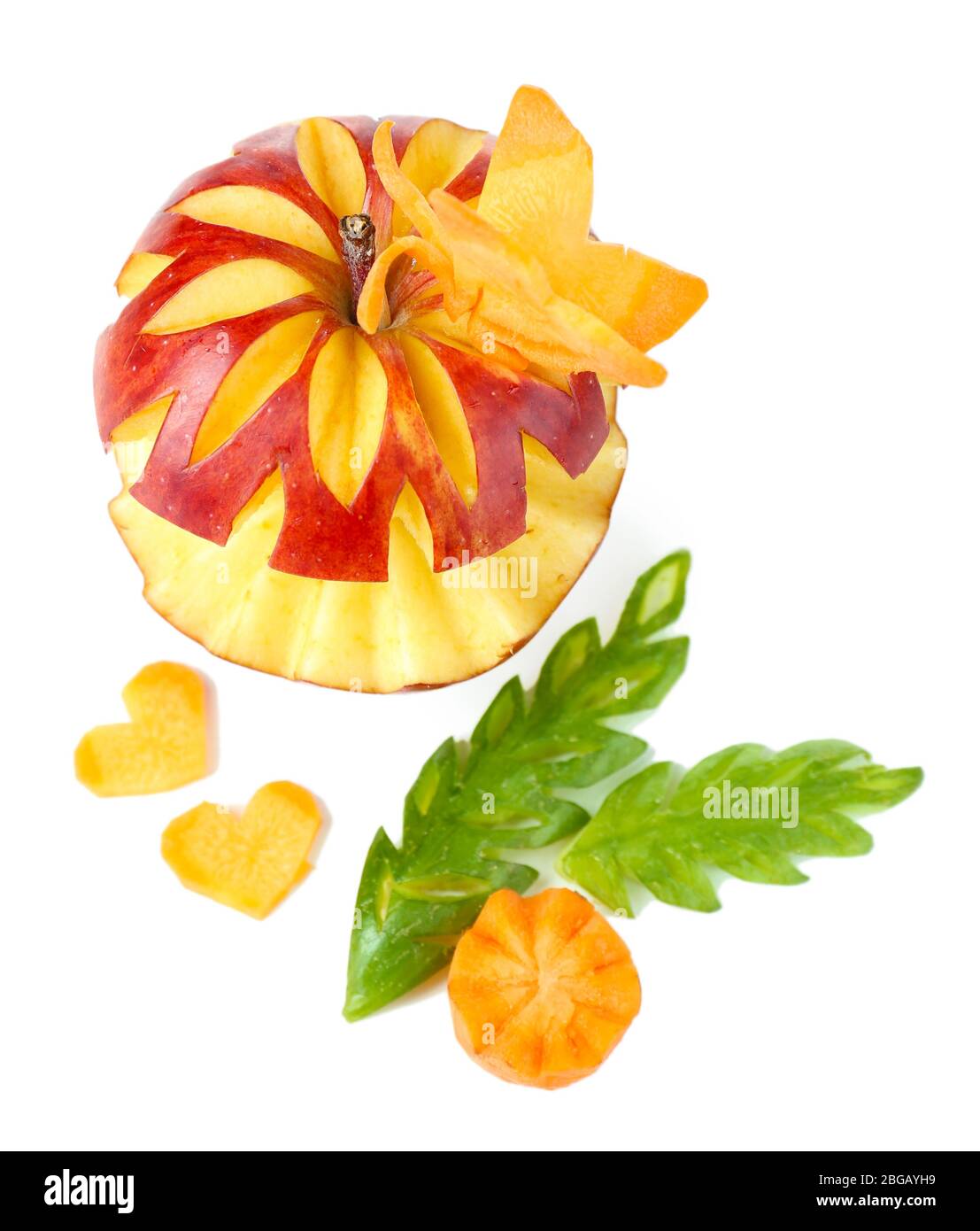 Carving apple isolated on white Stock Photo - Alamy