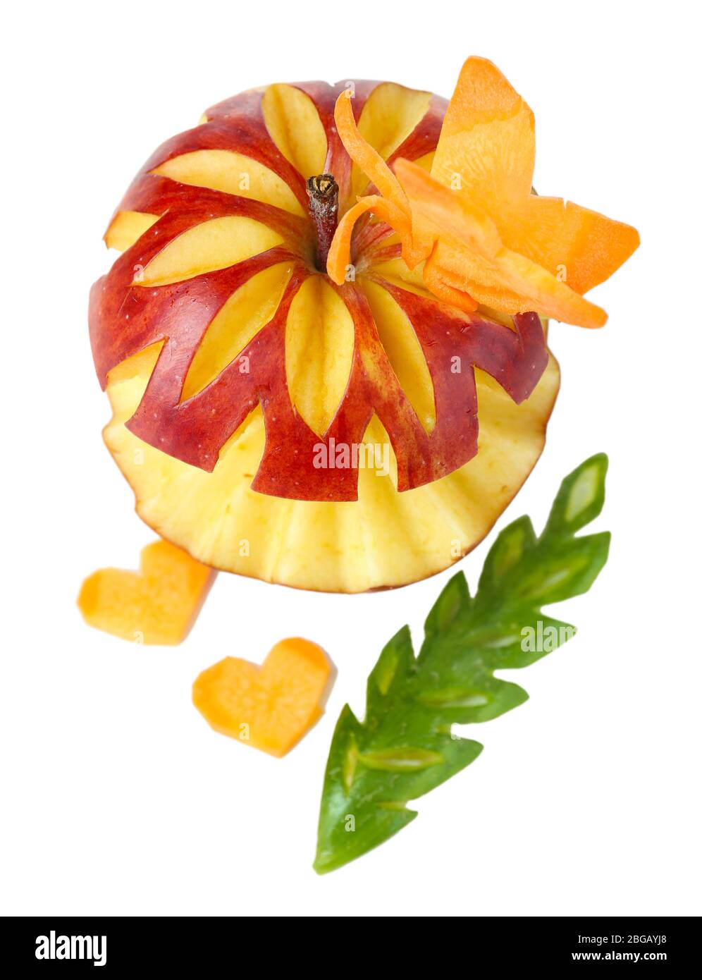 Carving apple isolated on white Stock Photo - Alamy