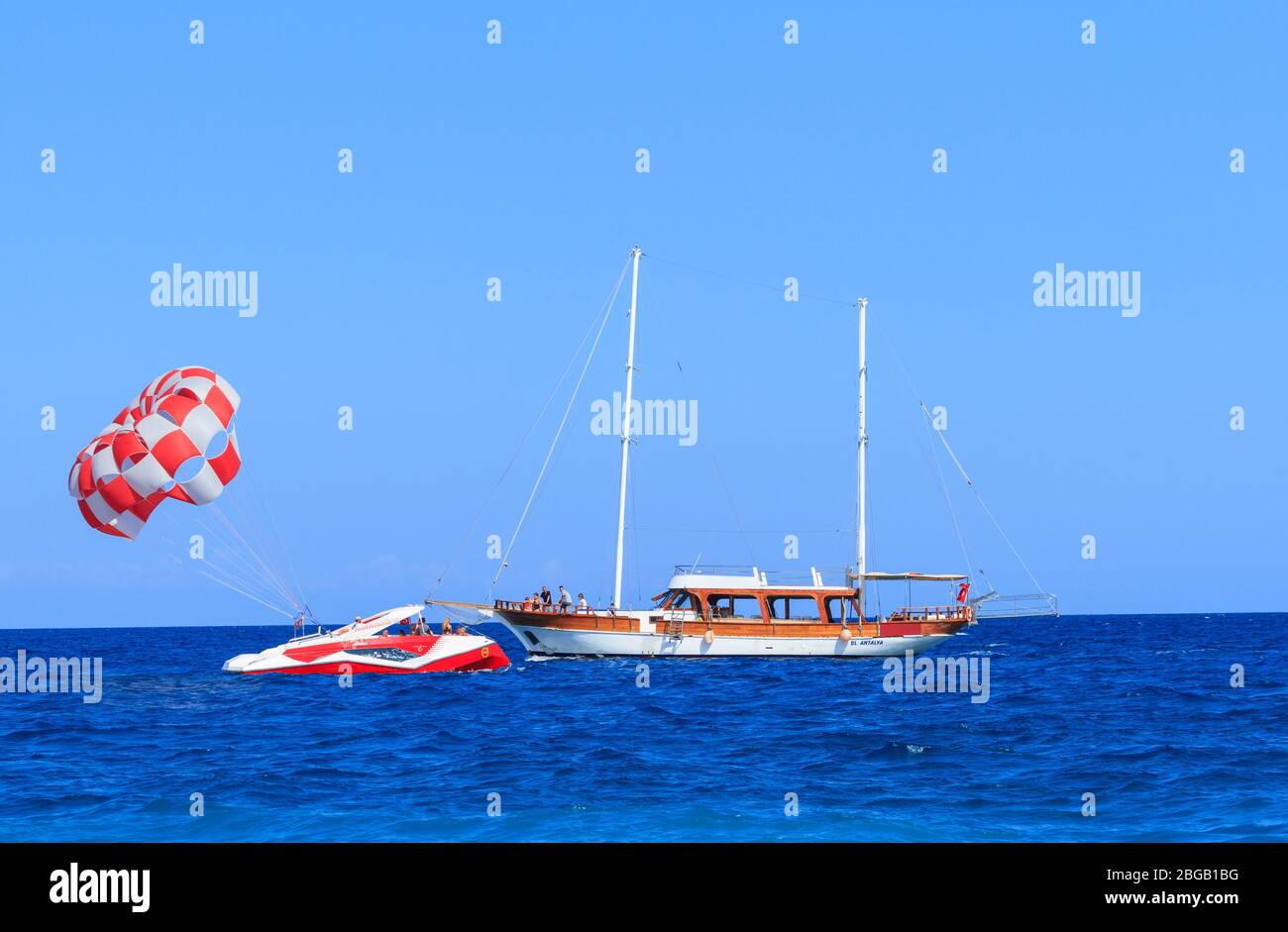 Kiris, Turkey - June 17, 2018:Yacht and powerboat with parachute on the ...