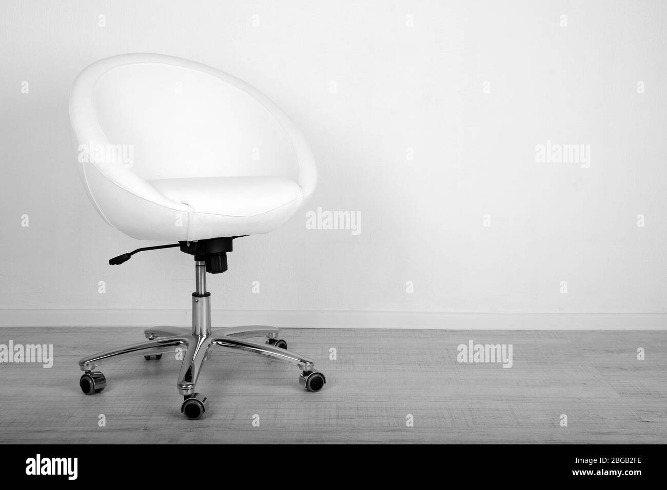 Modern chair in room on white background Stock Photo - Alamy