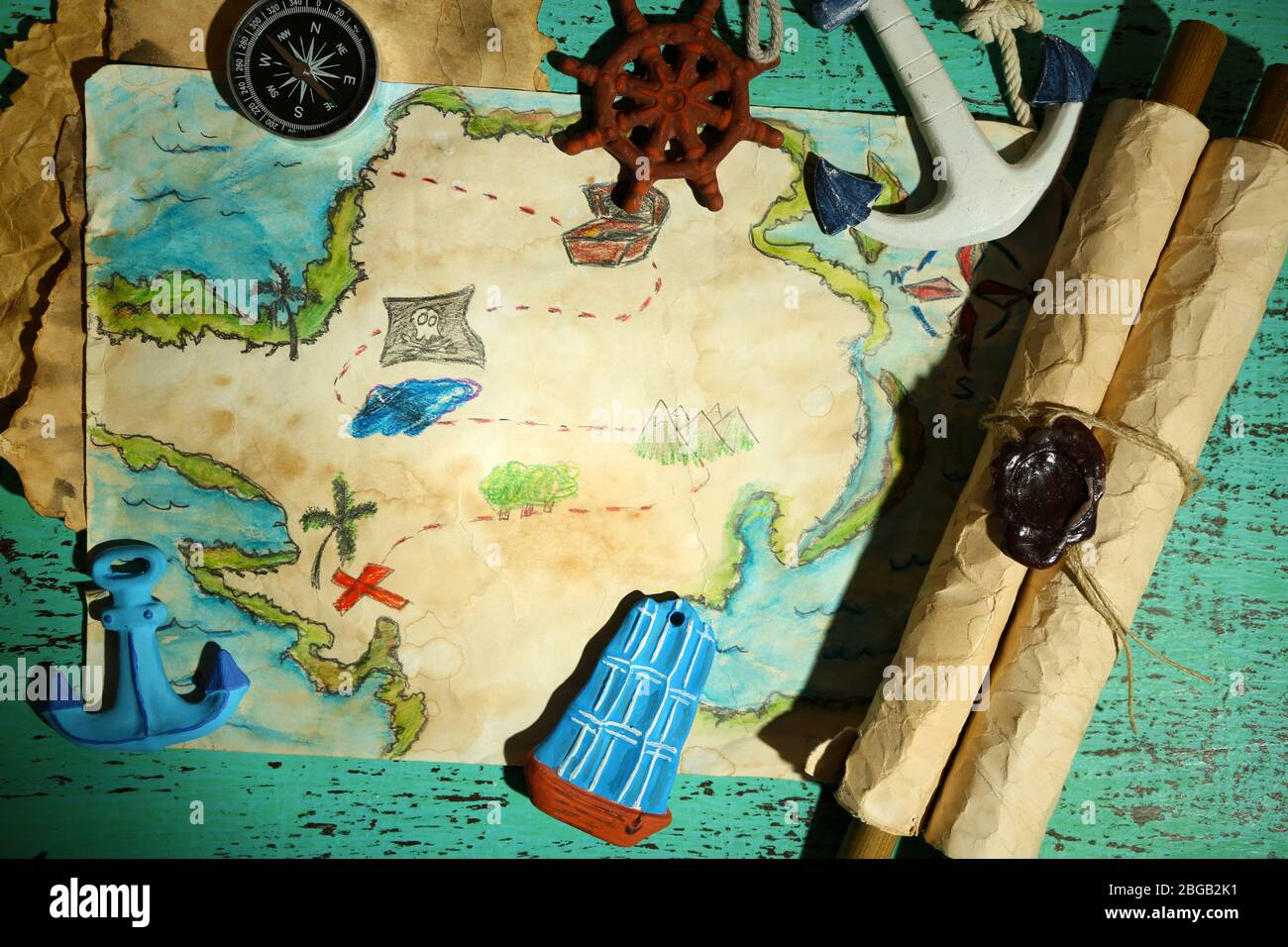 Treasure map with sea accessories, on wooden background Stock Photo - Alamy