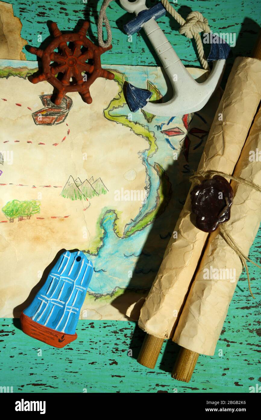 Treasure map with sea accessories, on wooden background Stock Photo - Alamy