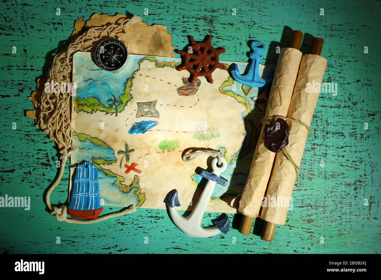 Treasure map with sea accessories, on wooden background Stock Photo - Alamy