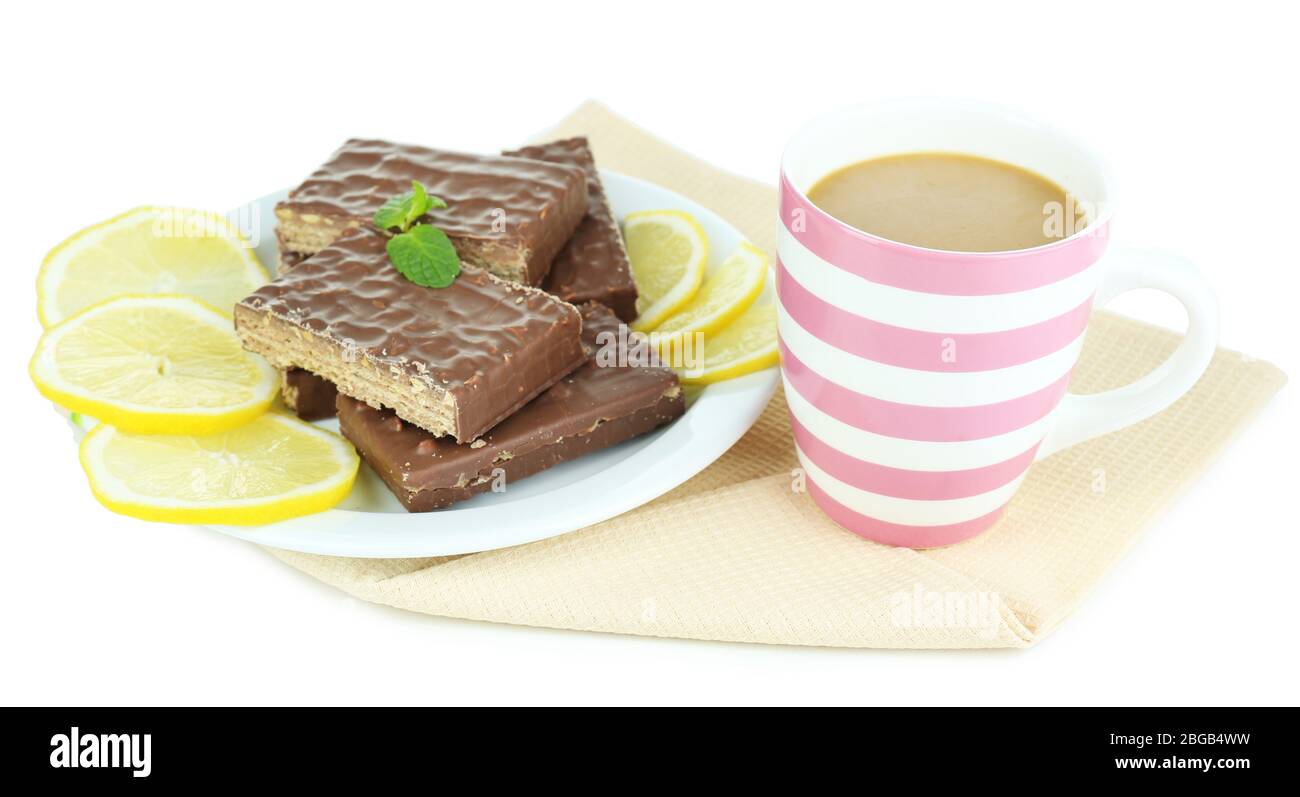 Cup of tea and sweets isolated on white Stock Photo - Alamy