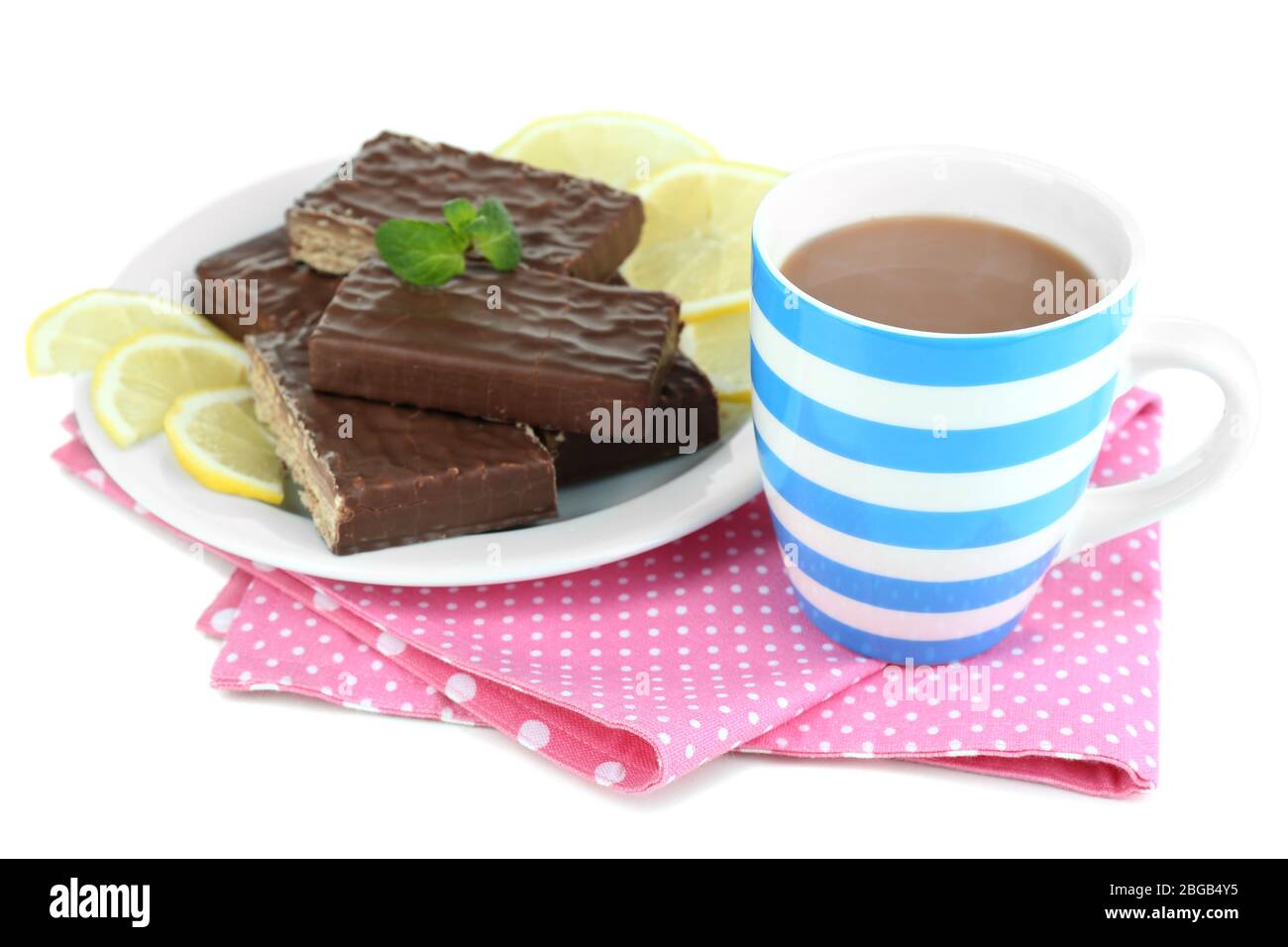 Cup of tea and sweets isolated on white Stock Photo - Alamy