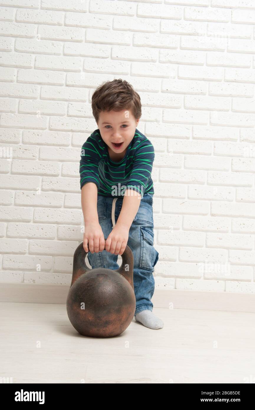 Child lift weight hi-res stock photography and images - Alamy