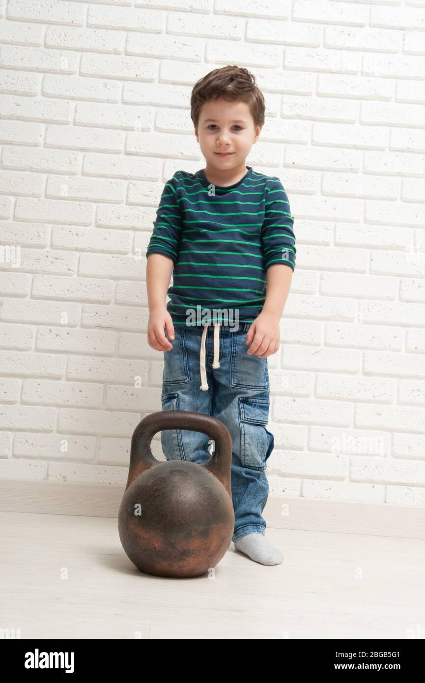Child lift weight hi-res stock photography and images - Alamy
