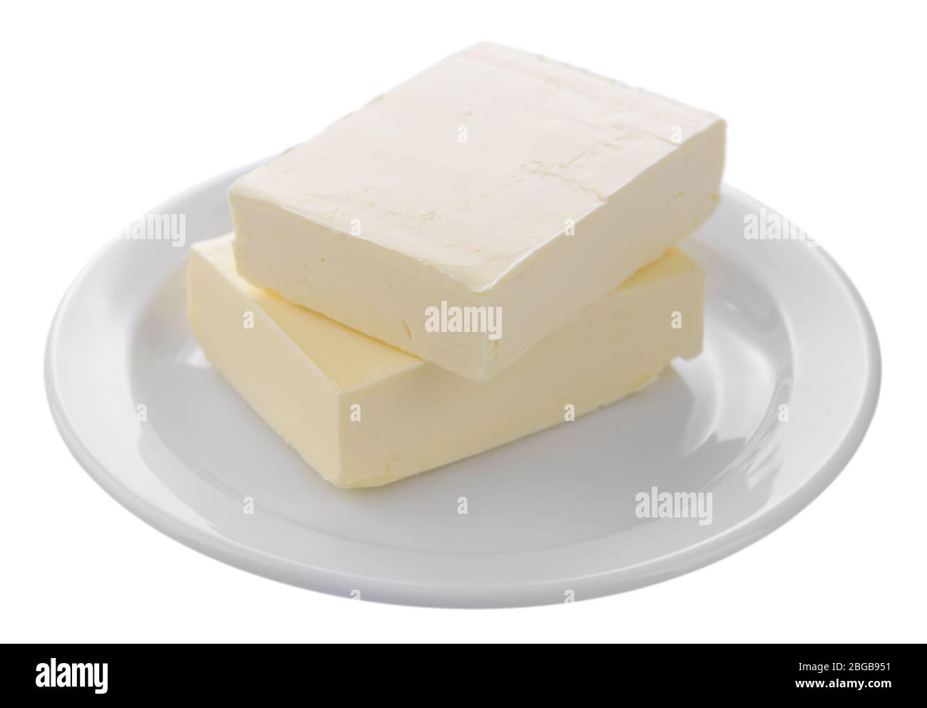 Tasty butter on plate isolated on white Stock Photo - Alamy