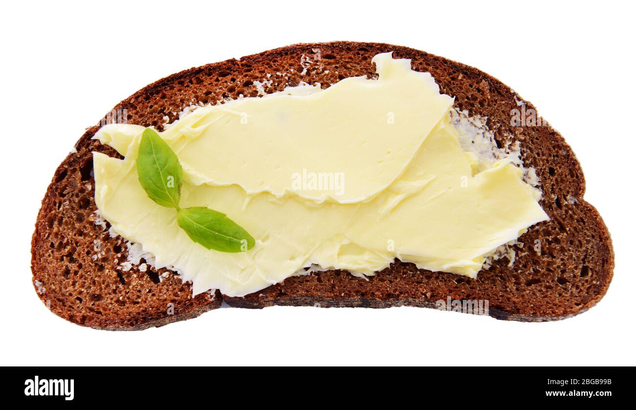 Slice of rye bread with butter, isolated on white Stock Photo - Alamy