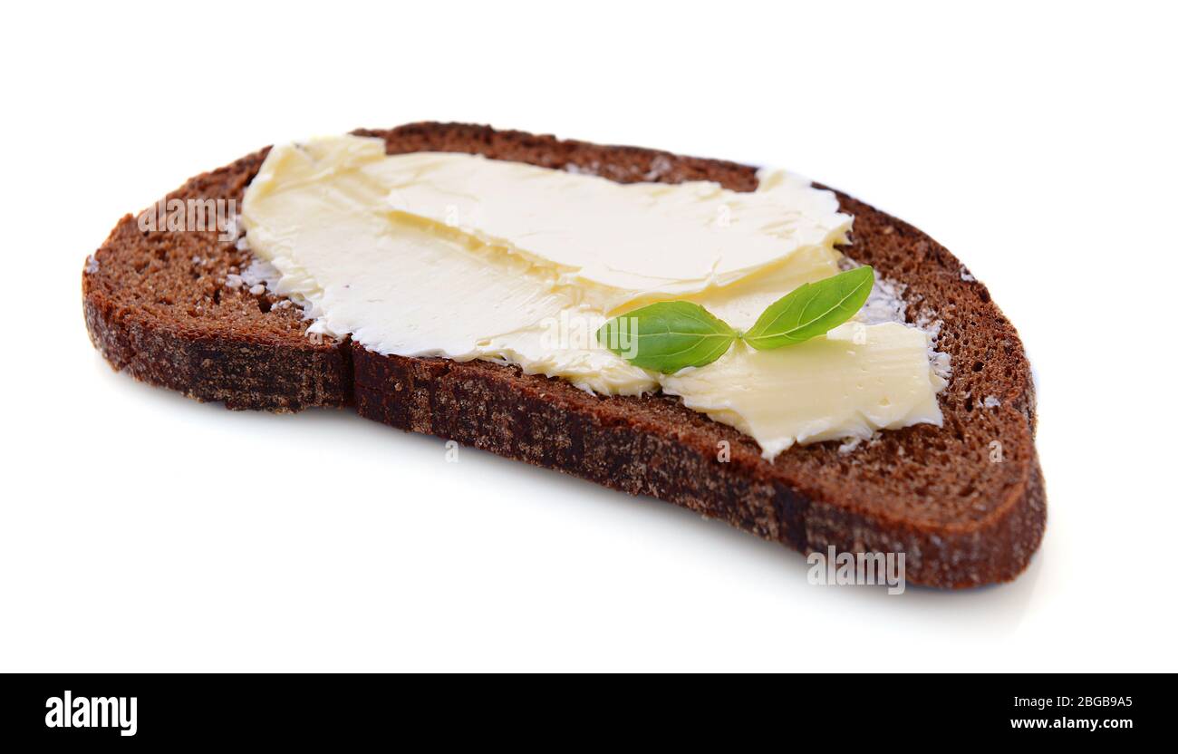 Slice of rye bread with butter, isolated on white Stock Photo - Alamy