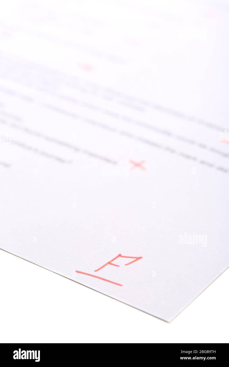 Grade written on an exam paper, close-up Stock Photo - Alamy