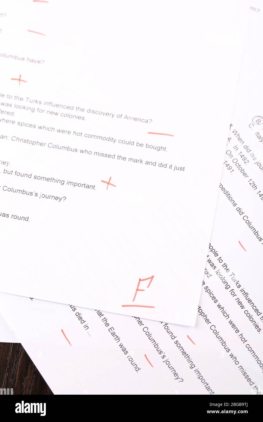 Grade written on an exam paper, close-up Stock Photo - Alamy