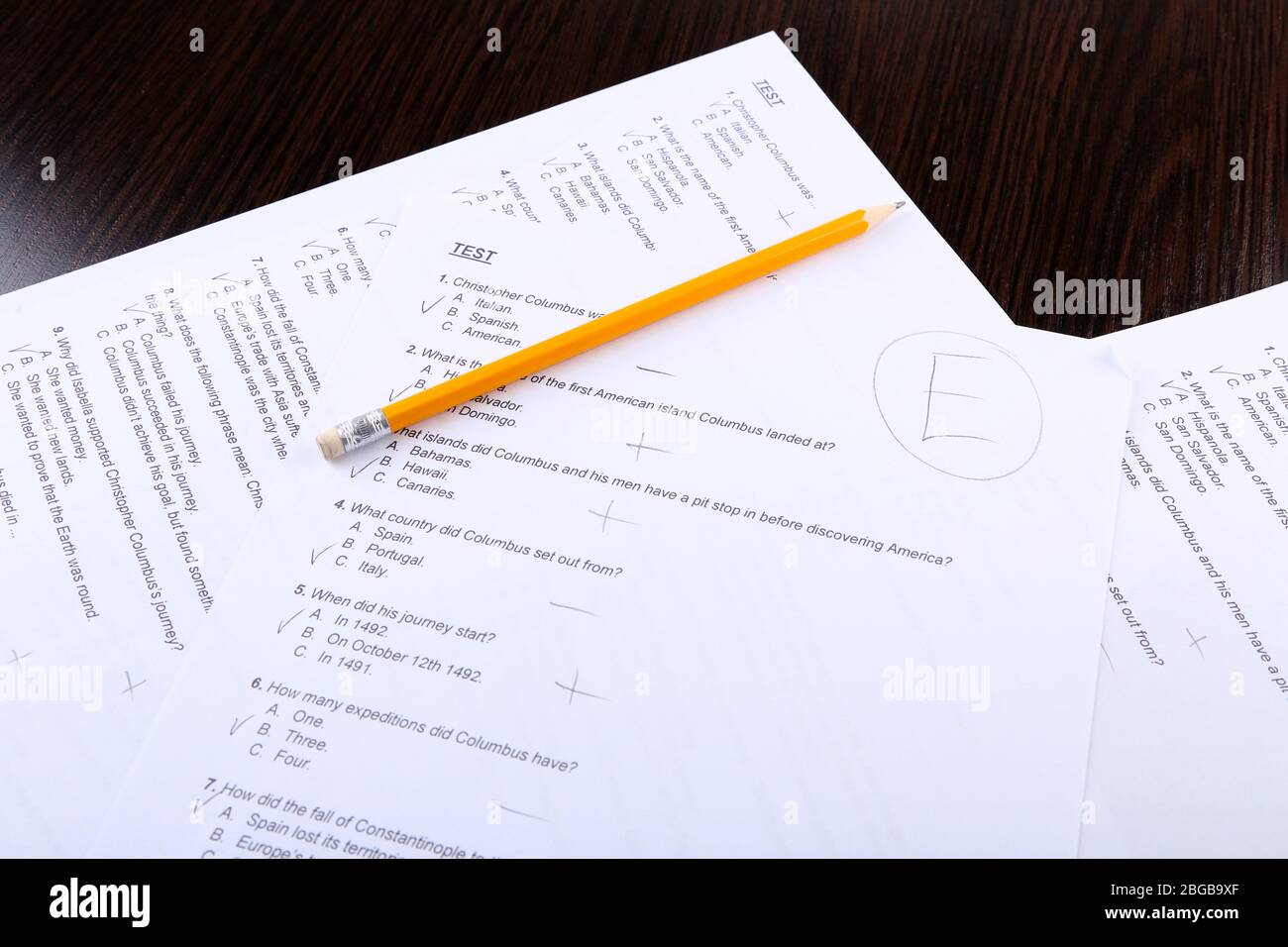 Grade written on an exam paper, close-up Stock Photo - Alamy