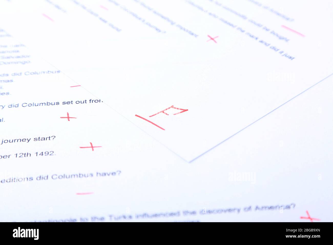 Grade written on an exam paper, close-up Stock Photo - Alamy