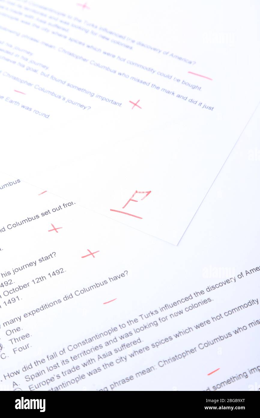 Grade written on an exam paper, close-up Stock Photo - Alamy