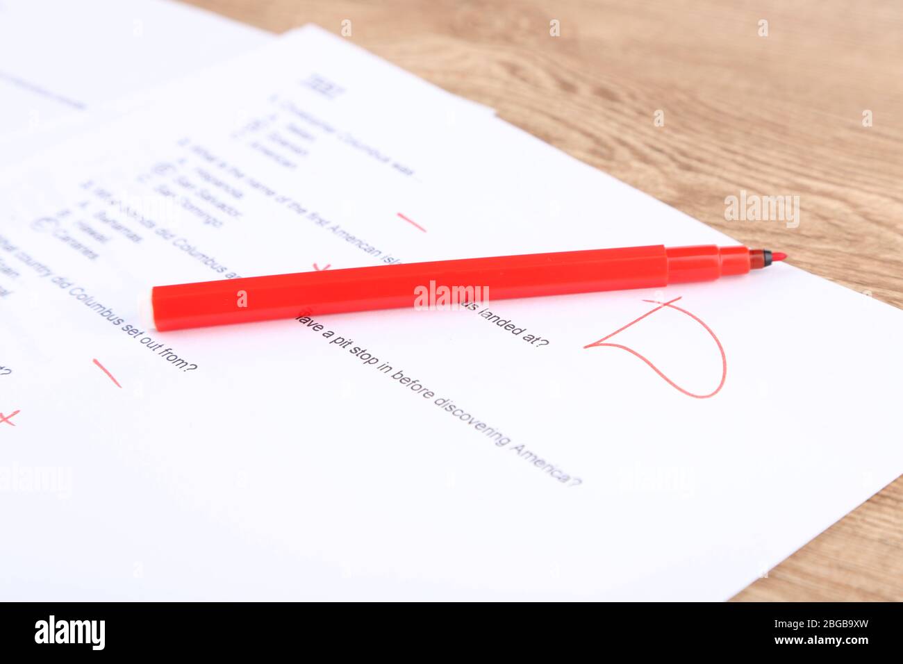 Grade written on an exam paper, close-up Stock Photo - Alamy