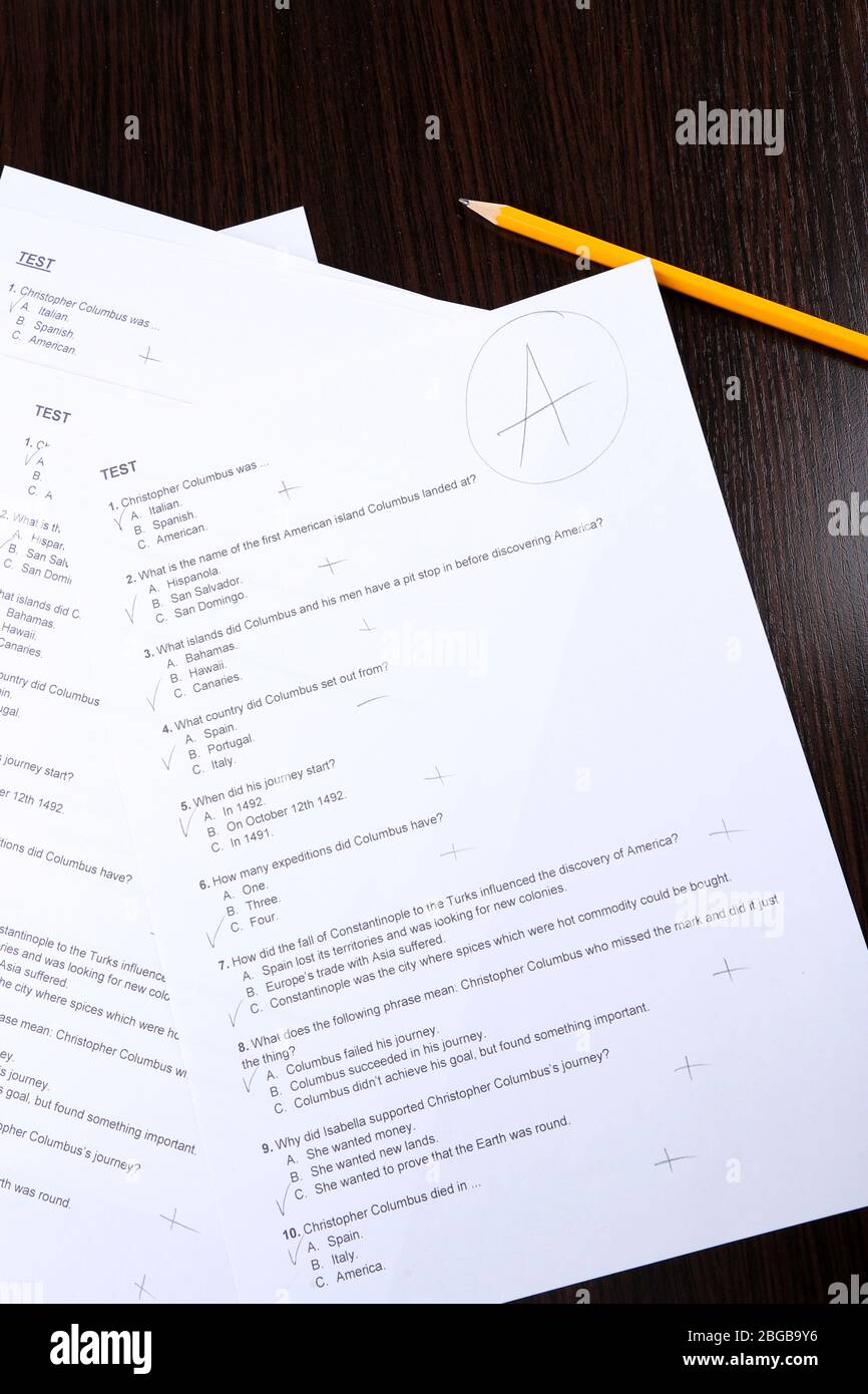 Grade written on an exam paper, close-up Stock Photo - Alamy