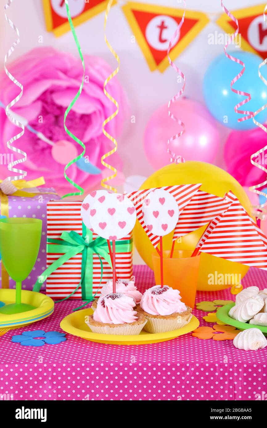 Festive table setting for birthday on celebratory decorations Stock ...