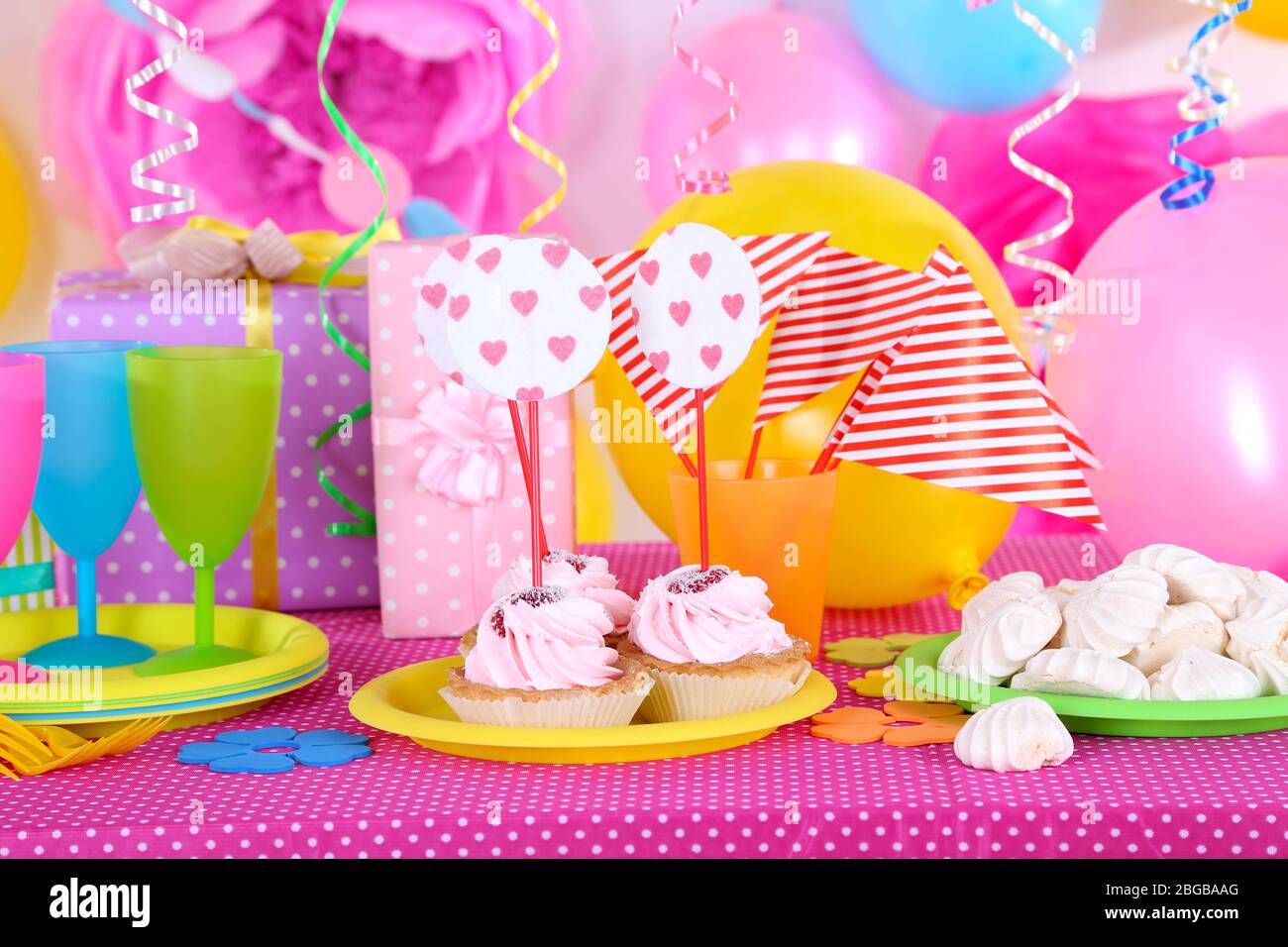 Festive table setting for birthday on celebratory decorations Stock ...