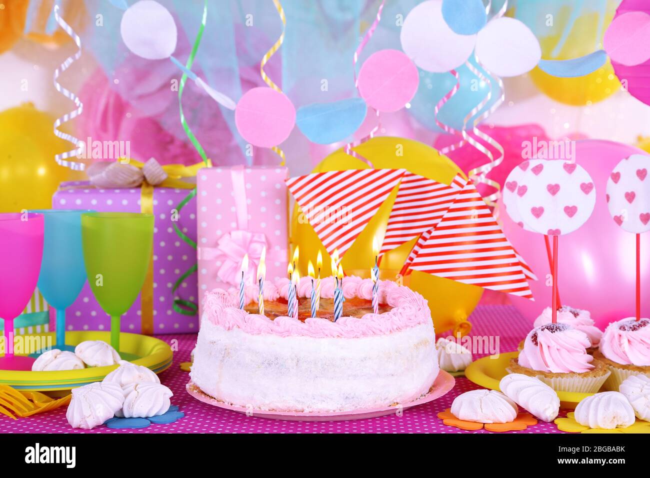 Festive table setting for birthday on celebratory decorations Stock ...